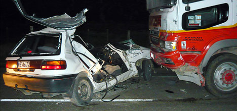 SunLive - Car pinned under truck - The Bay's News First
